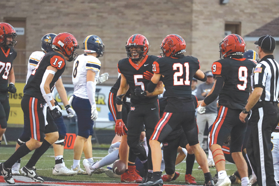 Marquette Sentinels football team wins 41-32 shootout over Cadillac ...